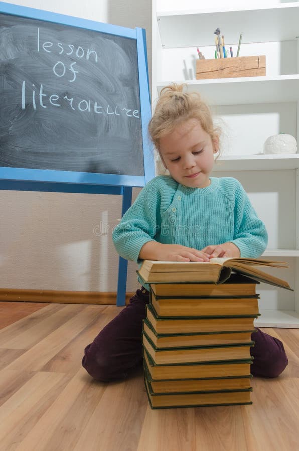 Elementary School Student with a Book Stock Photo - Image of knowledge ...
