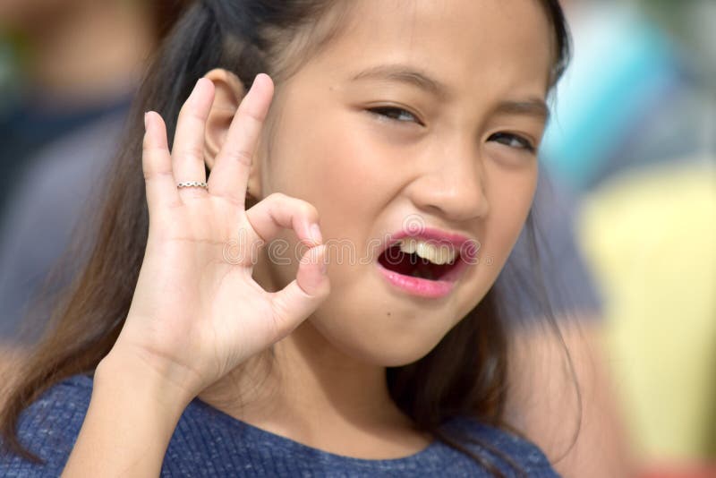 Girl Child and Okay Sign stock image. Image of girl - 152075229