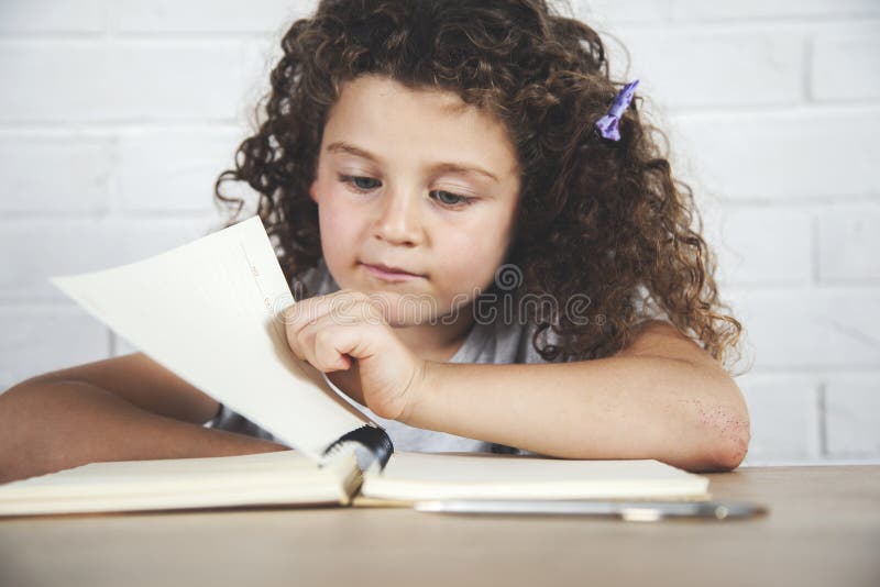 Girl children hand notepad stock photo. Image of school - 157417528
