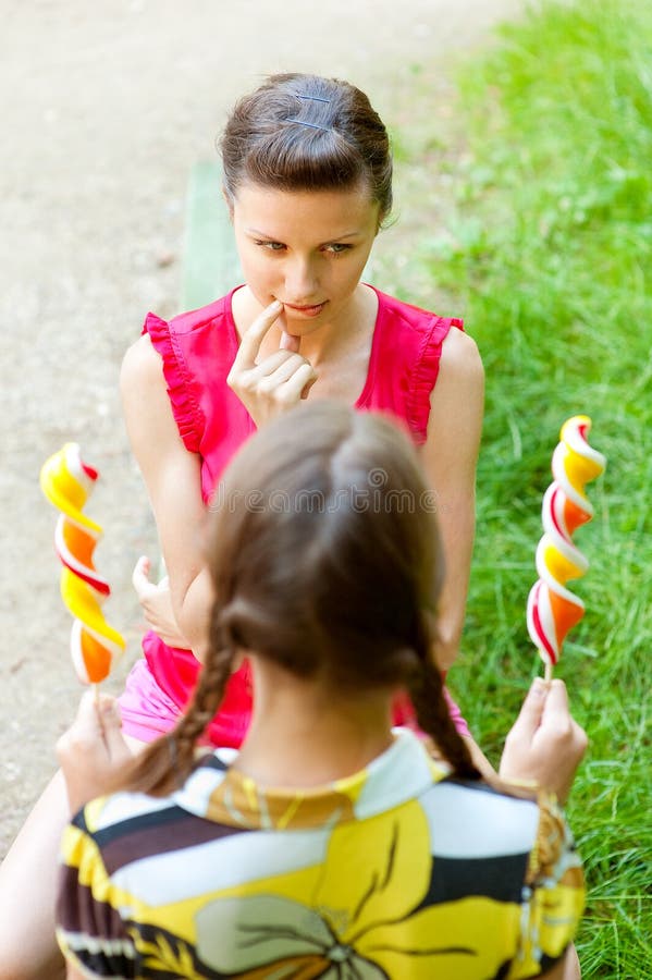 Girl chooses sugar candy stock photo. Image of colorful - 13201074