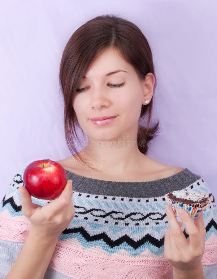Girl choosing an apple stock image. Image of choose, figure - 21699681