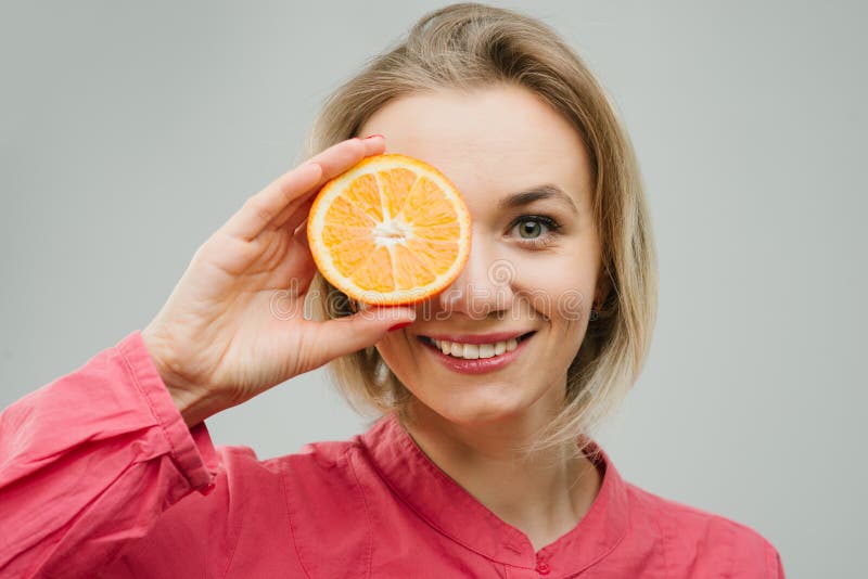 Girl with Citrus in Her Hands Stock Photo - Image of citrus, woman ...
