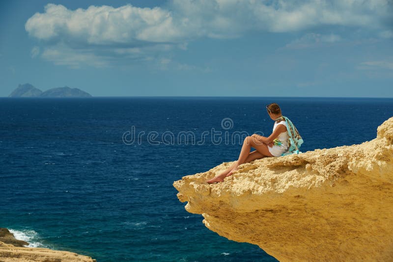 A girl on the cliff. stock image. Image of cliff, nature - 91643943