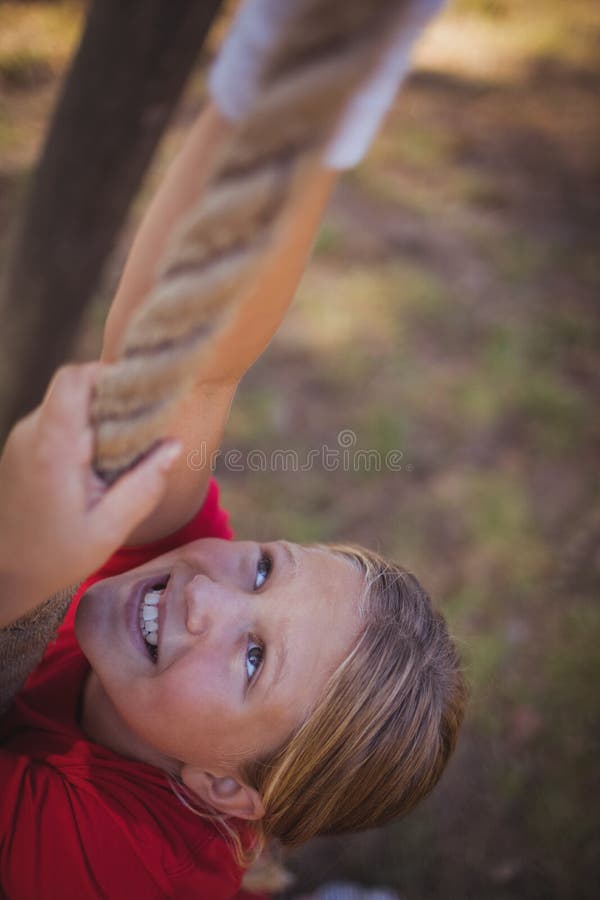 Girl Climbing a Rope during Obstacle Course Training Stock Image ...
