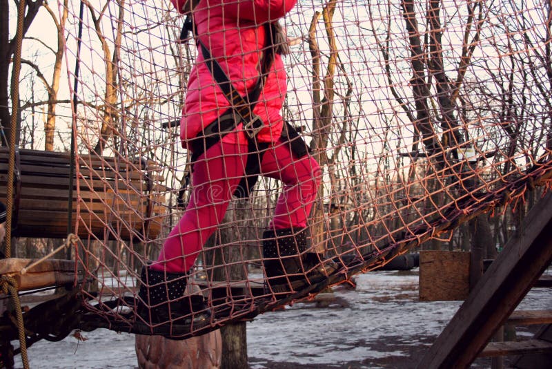 Girl climbing in a rope stock image. Image of happy, climb - 67978877