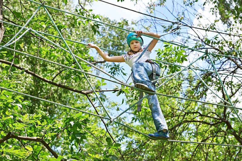 Girl is Climbing To High Rope Bridge Stock Image - Image of brave, girl ...