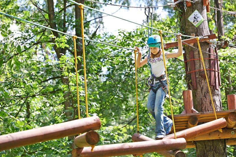 Girl is Climbing To High Rope Structures Stock Photo - Image of belt ...