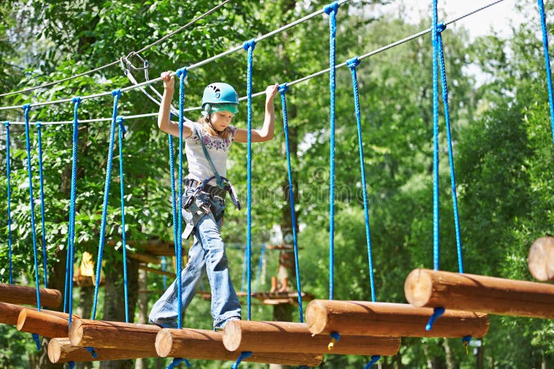 Girl is Climbing To High Rope Structures Stock Photo - Image of pulley ...