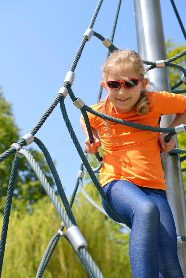 Girl Climbing Up the Ropes. Stock Image - Image of safety, enjoy: 34208397
