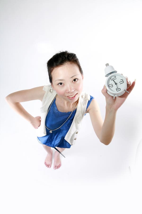 Girl with clock stock photo. Image of women, woman, female - 9849380