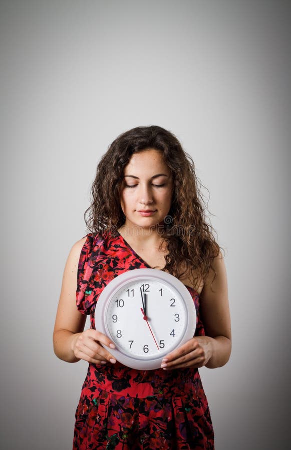 Girl and clock. stock photo. Image of attractive, hour - 43345582
