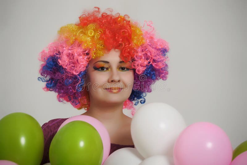 Girl in Clown Wig with Balloons Stock Image - Image of attractive ...