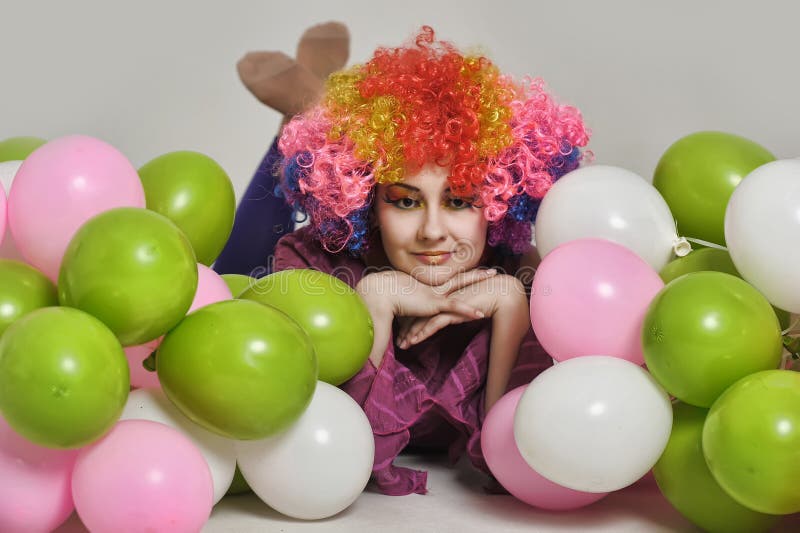 Girl in Clown Wig with Balloons Stock Photo - Image of beauty, color ...
