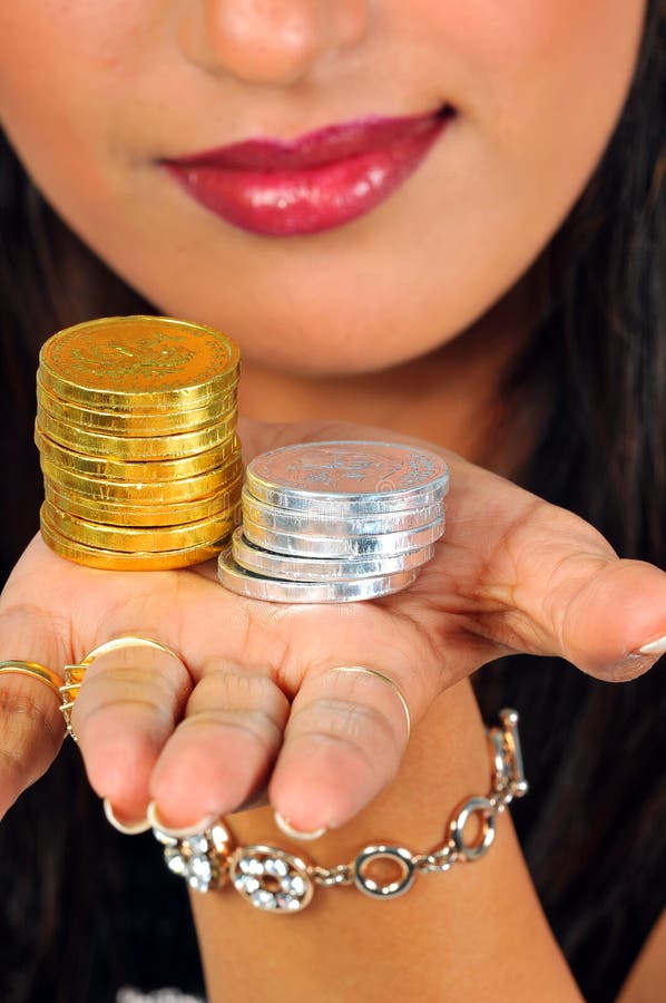 Girl with coins stock photo. Image of eyes, pose, heap - 8647994