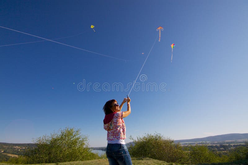 Girl with flying kite stock image. Image of young, girl - 26998229