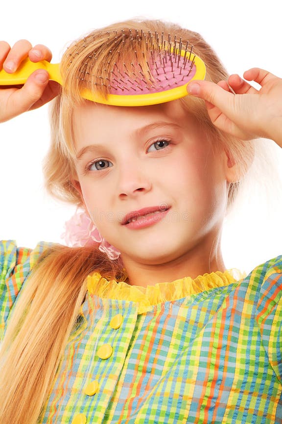 Girl with comb stock image. Image of happy, emotional - 11322745