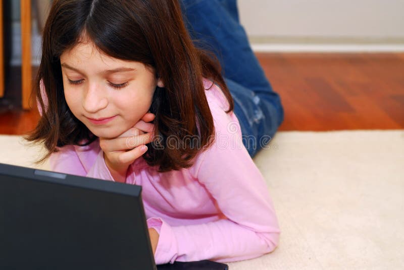 Girl computer stock image. Image of lying, house, educational - 1614359