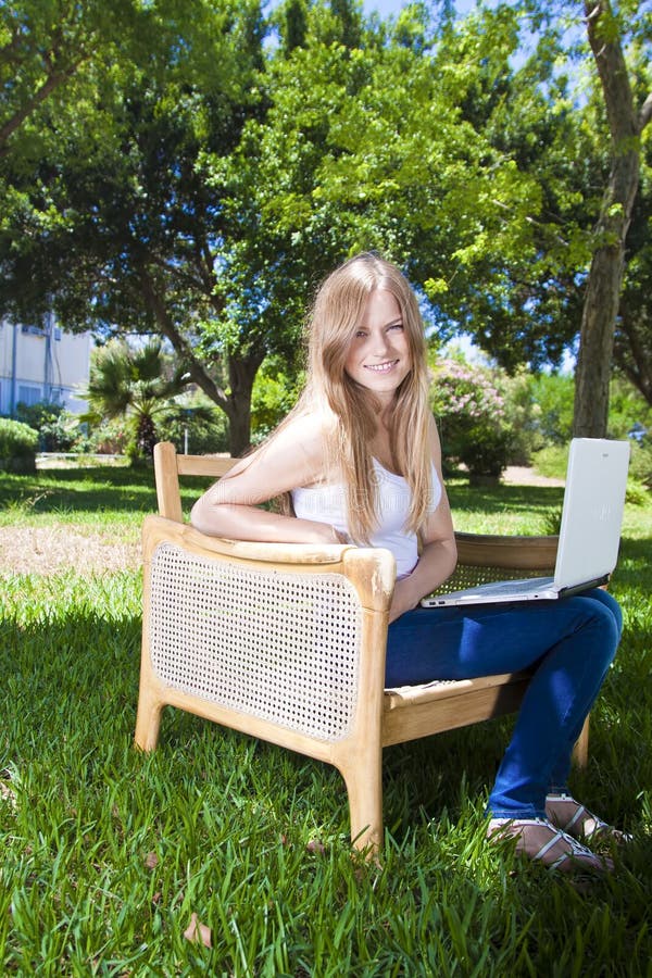 Girl with computer stock image. Image of looking, enjoyment - 20164413