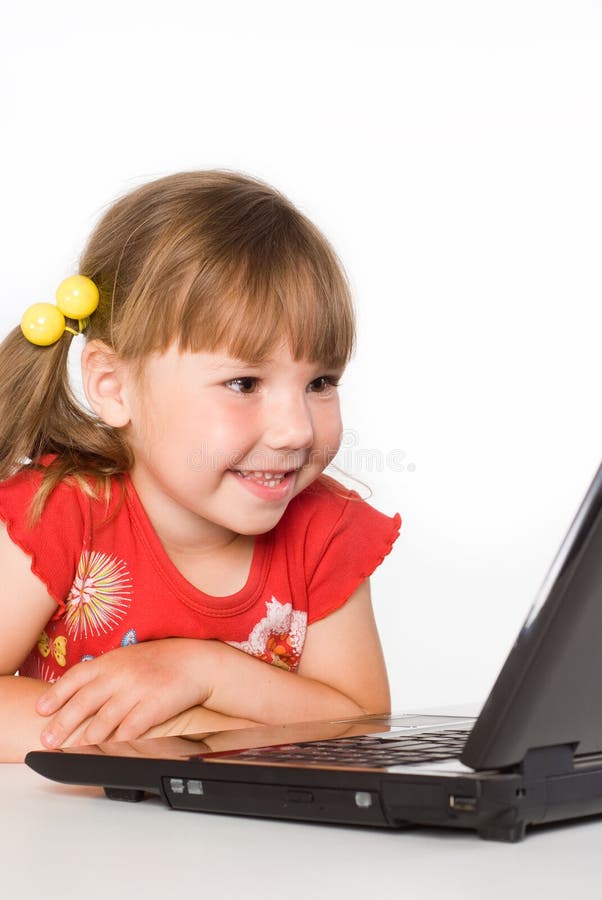 Beautiful Little Girl with Laptop Computer. Stock Photo - Image of ...