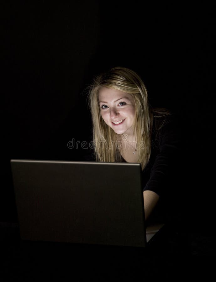 Girl with computer stock image. Image of girl, dark, computing - 9224835