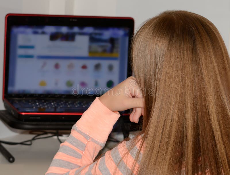 Girl at the computer desk. stock image. Image of head - 46435999