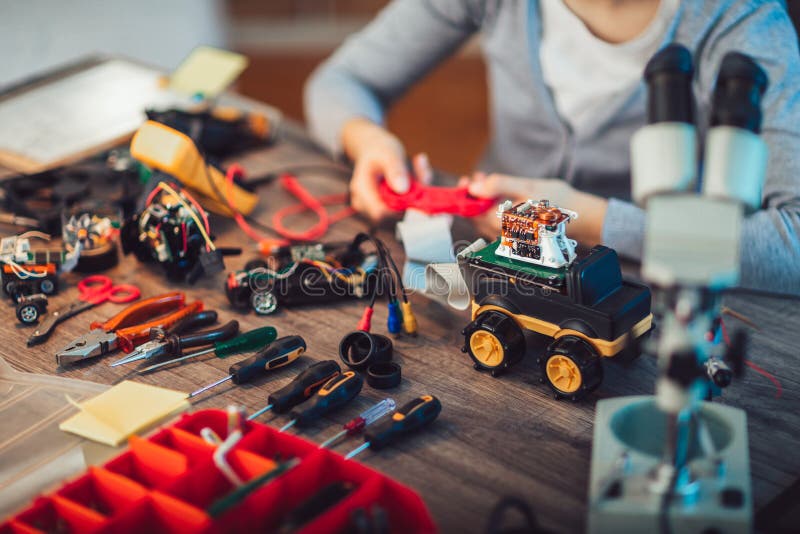 Girl Constructs Technical Toy. Stock Photo - Image of indoors, engineer ...