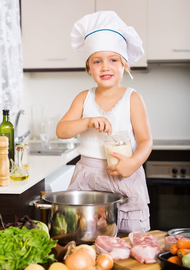 Girl in Cook Hat Cooking Soup Stock Photo - Image of daughter, prepare ...