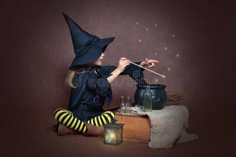 Girl in a Costume of Witch Making Magic Potion Stock Photo - Image of ...