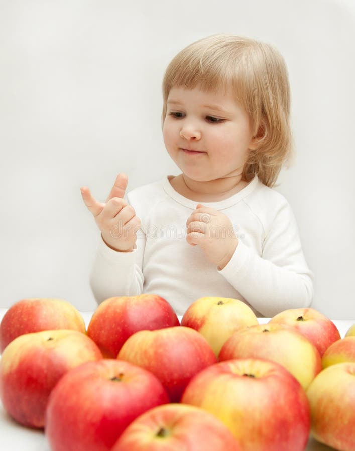 The Girl is Counting Apples Stock Photo - Image of apple, juicy: 22608120
