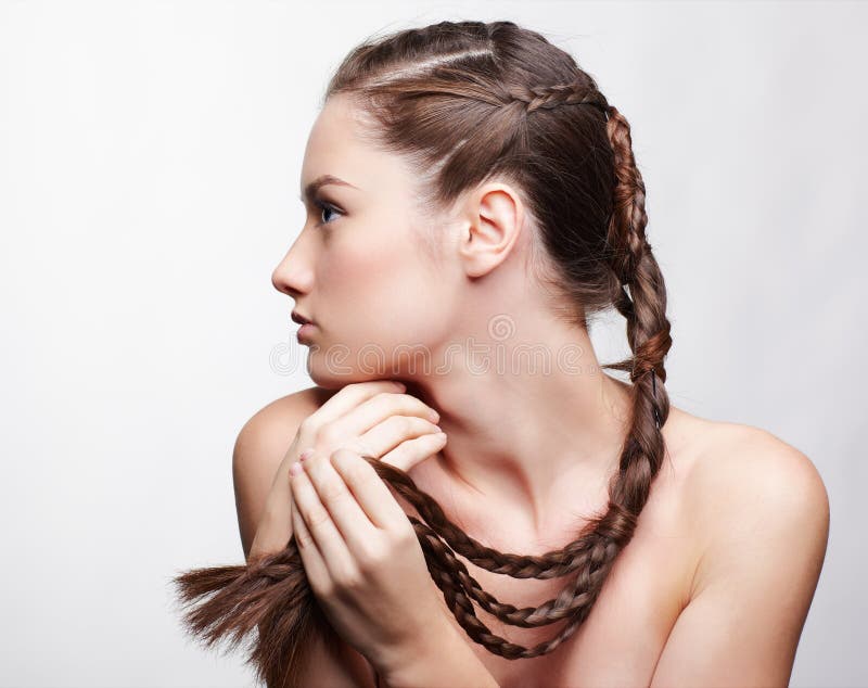 Girl with creative hair-do stock image. Image of braid - 18871479