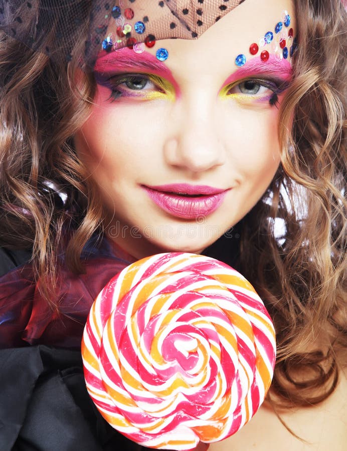 Girl with with Creative Make-up Holds Lollipop. Stock Photo - Image of ...