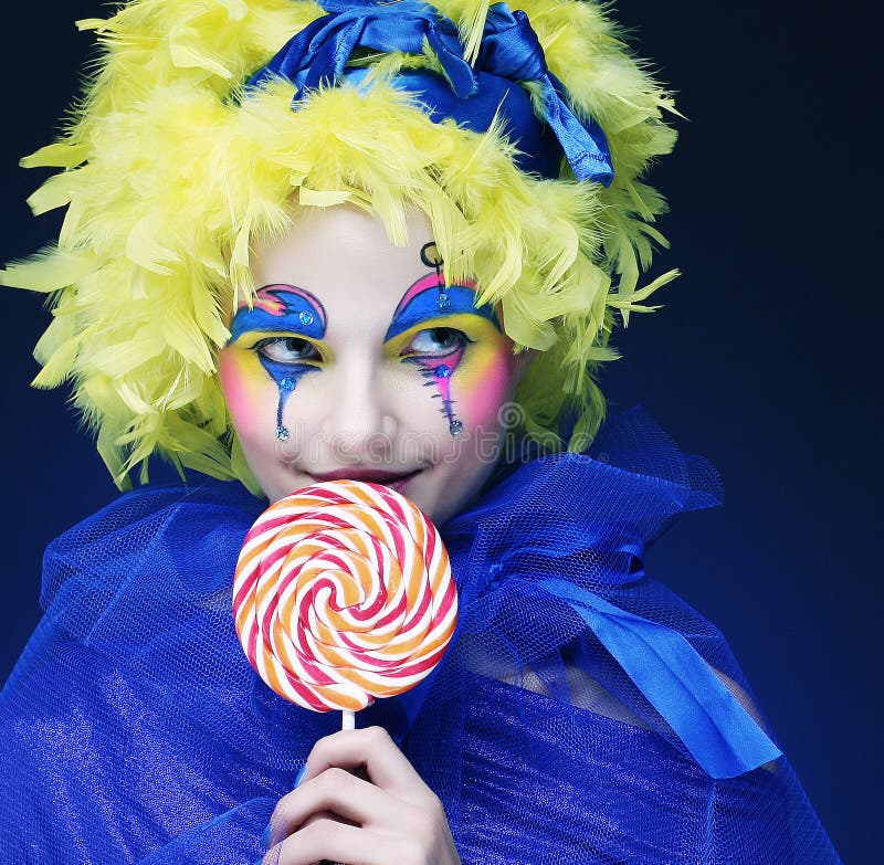 Girl with with Creative Make-up Holds Lollipop Stock Image - Image of ...