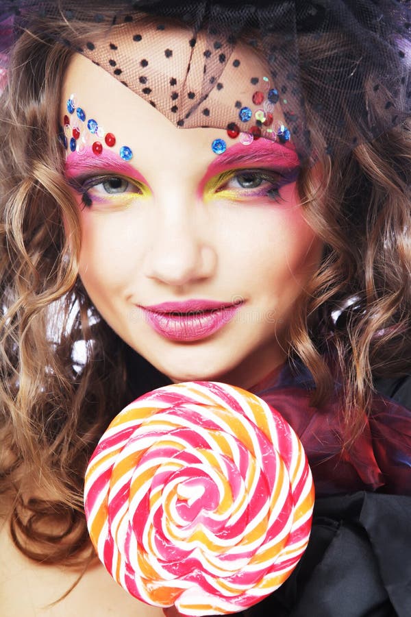 Girl with with Creative Make-up Holds Lollipop. Stock Image - Image of ...