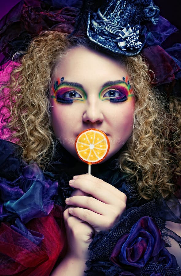 Girl with with Creative Make-up Holds Lollipop Stock Photo - Image of ...