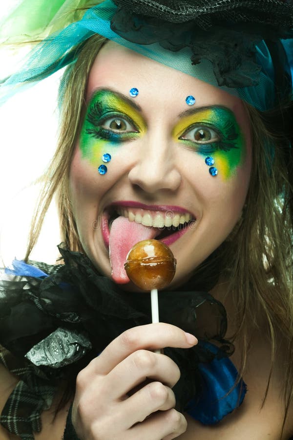 Girl with with Creative Make-up Holds Lollipop Stock Photo - Image of ...