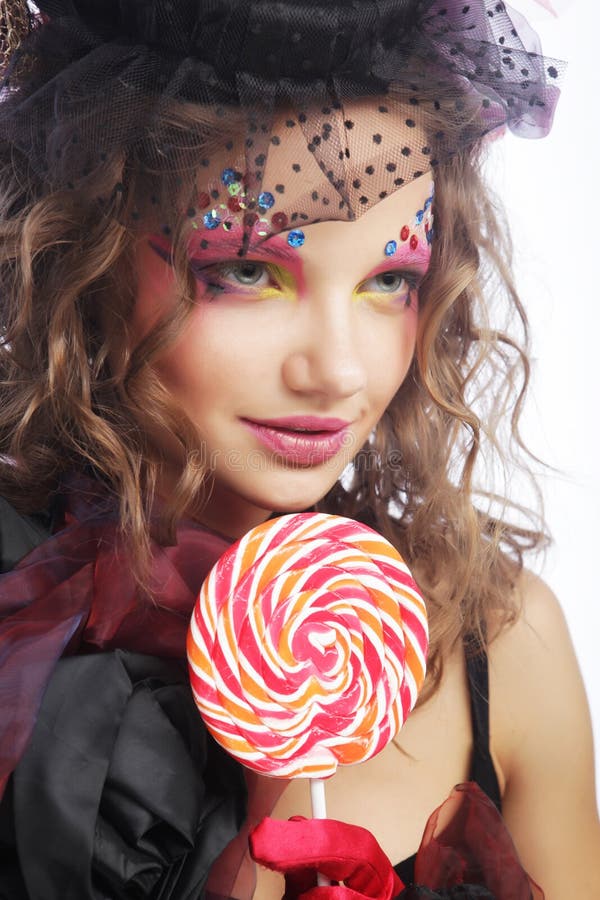 Girl with with Creative Make-up Holds Lollipop. Stock Image - Image of ...