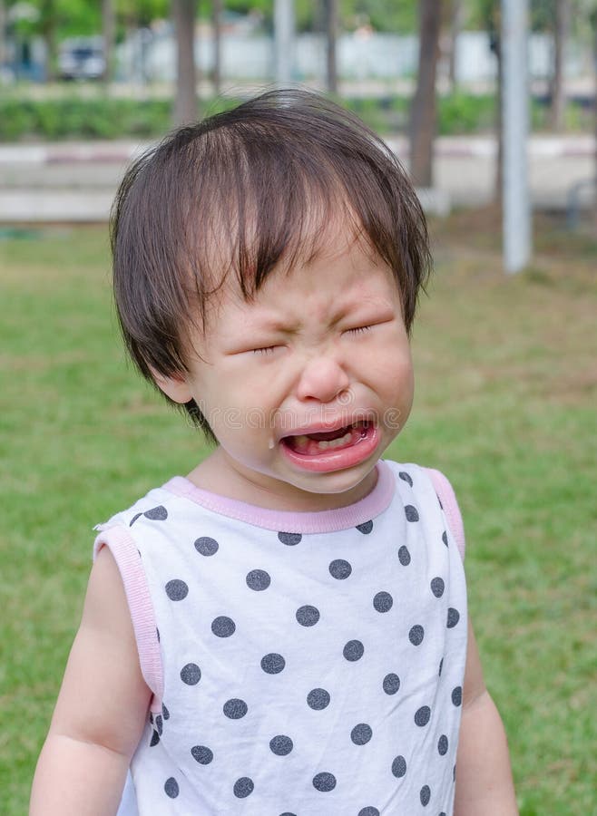 Girl crying in park stock image. Image of pain, child - 52301111