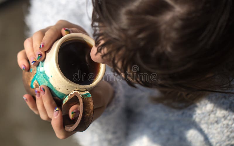 Girl with a cup in hands stock image. Image of beauty - 112652361