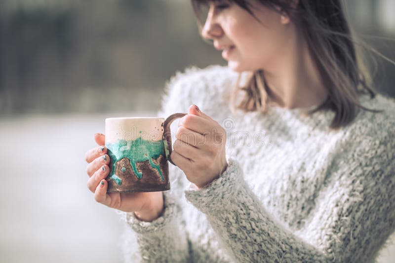 Girl with a cup in hands stock image. Image of food - 112652395