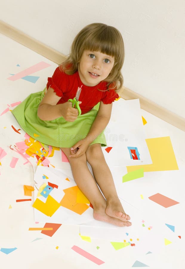 Girl cut colored paper stock image. Image of trim, happy - 14915103