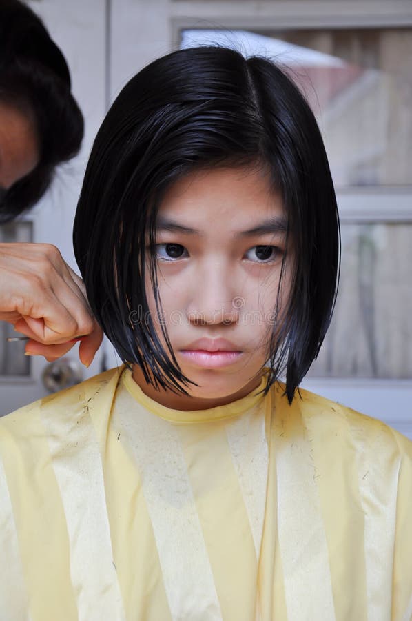 Girl is cutting hair stock image. Image of cutting, asian - 19324045