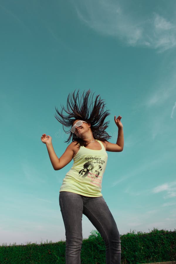 Girl dancing stock photo. Image of meadow, blue, flower - 10549816