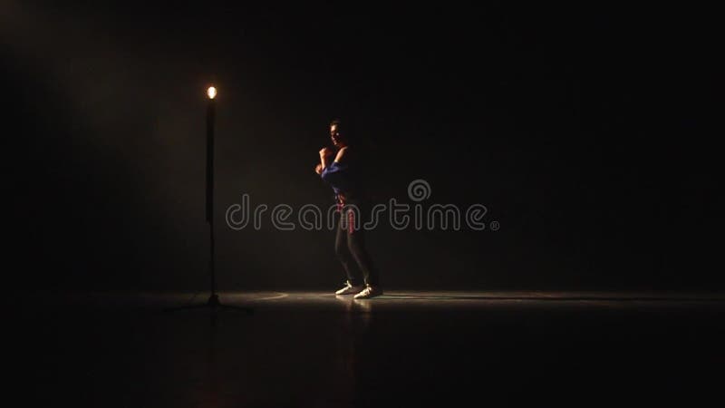 Girl Dancing in the Dark with a Light Bulb. Stock Footage - Video of ...