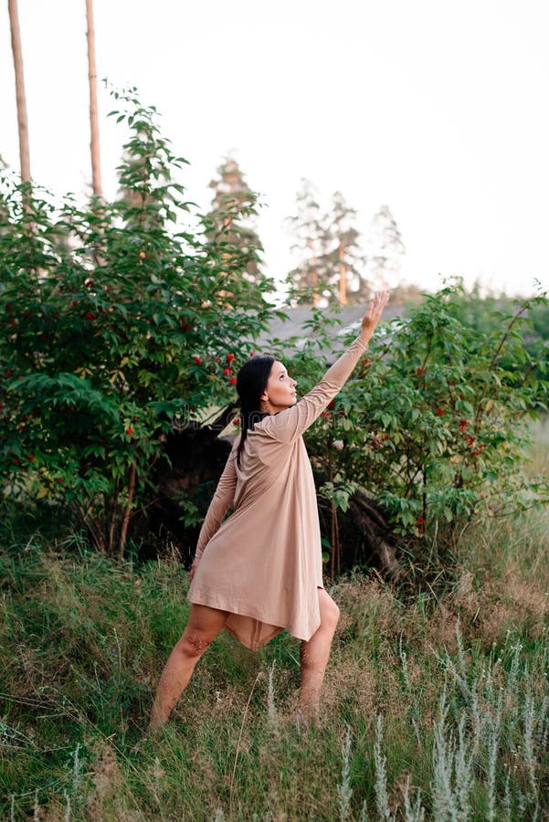 Girl Dancing in the Summer in a Pine Forest Stock Photo - Image of ...