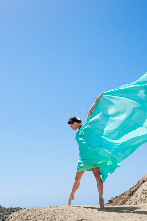 Girl dancing in the wind stock photo. Image of waving - 54503952
