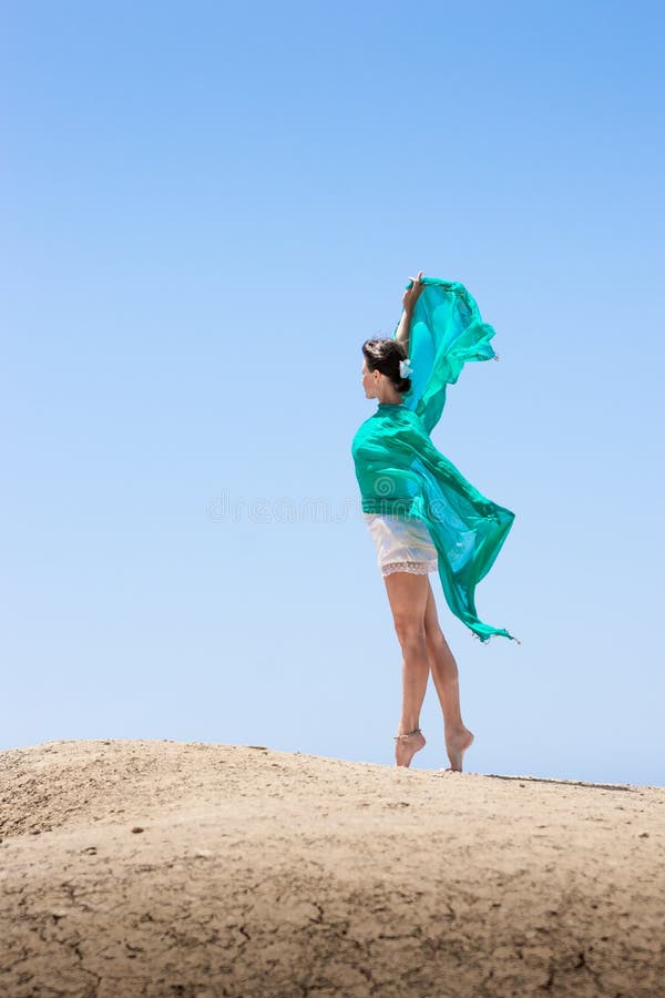Girl dancing in the wind stock photo. Image of flag, colors - 54504066