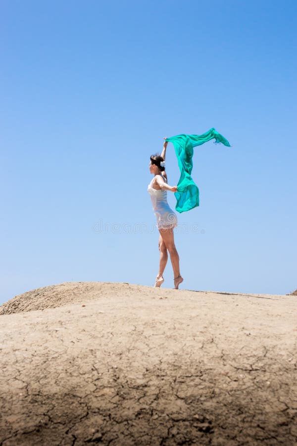 Girl dancing in the wind stock photo. Image of colors - 54504138