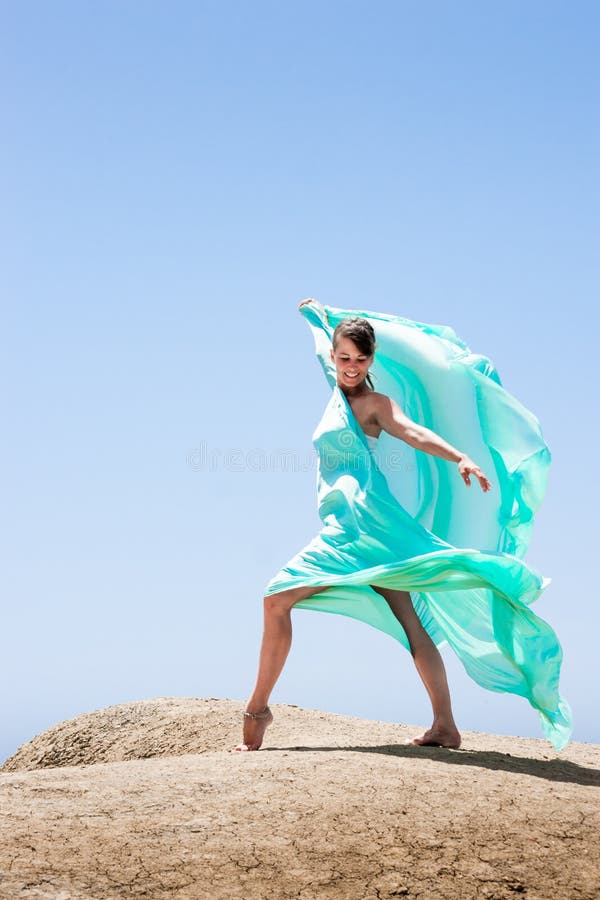 Girl dancing in the wind stock photo. Image of dancing - 54504940