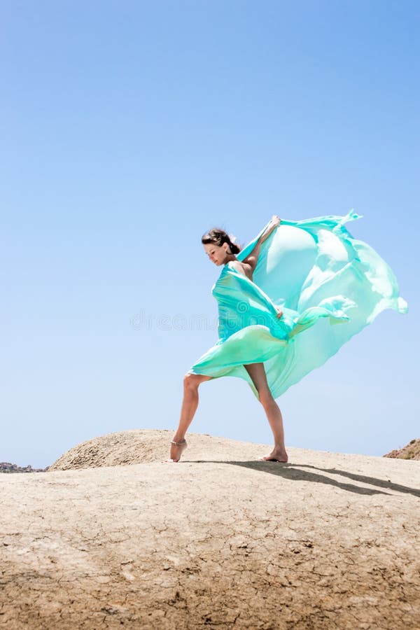 Girl dancing in the wind stock photo. Image of dancing - 54504940
