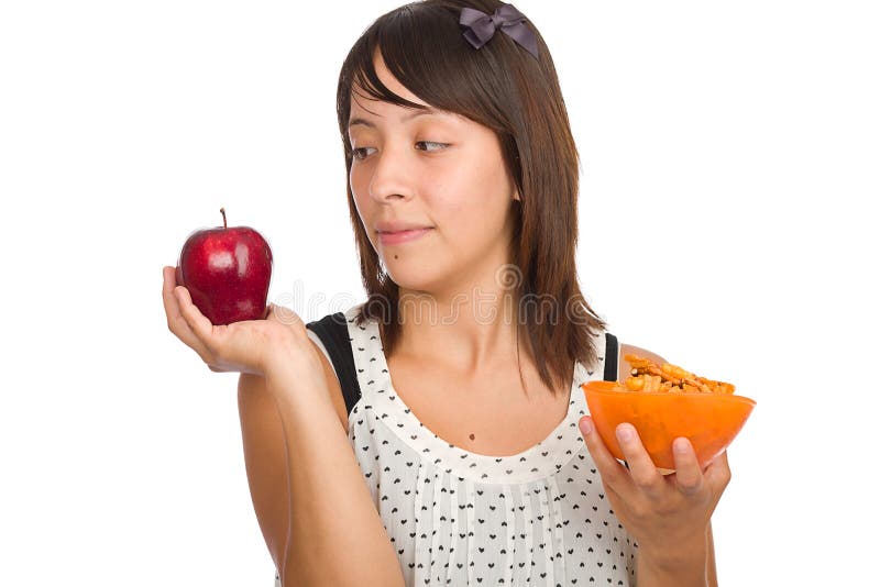 Girl Deciding between Healthy and Junk Food Stock Photo - Image of ...